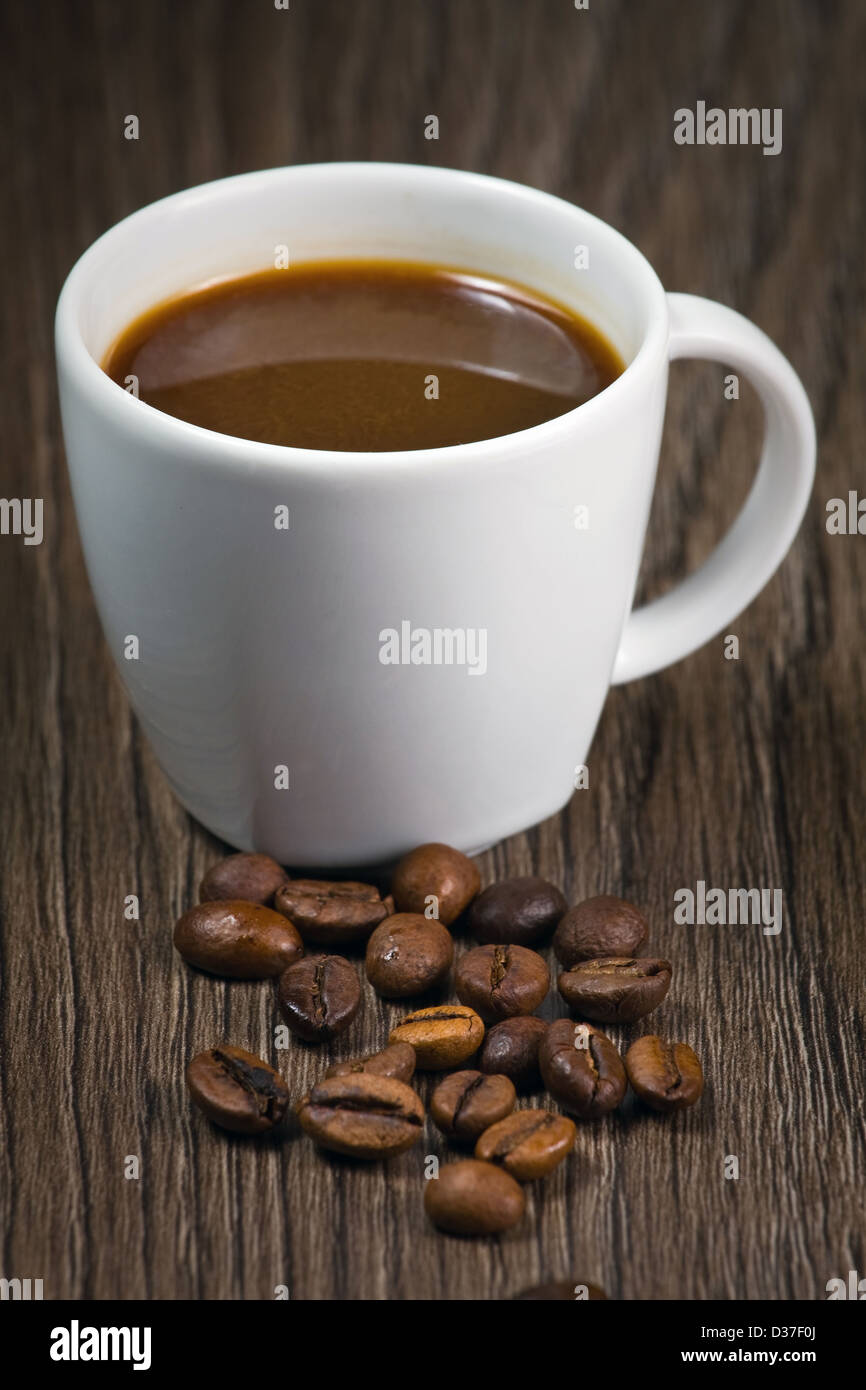 Cup full of coffee Stock Photo - Alamy
