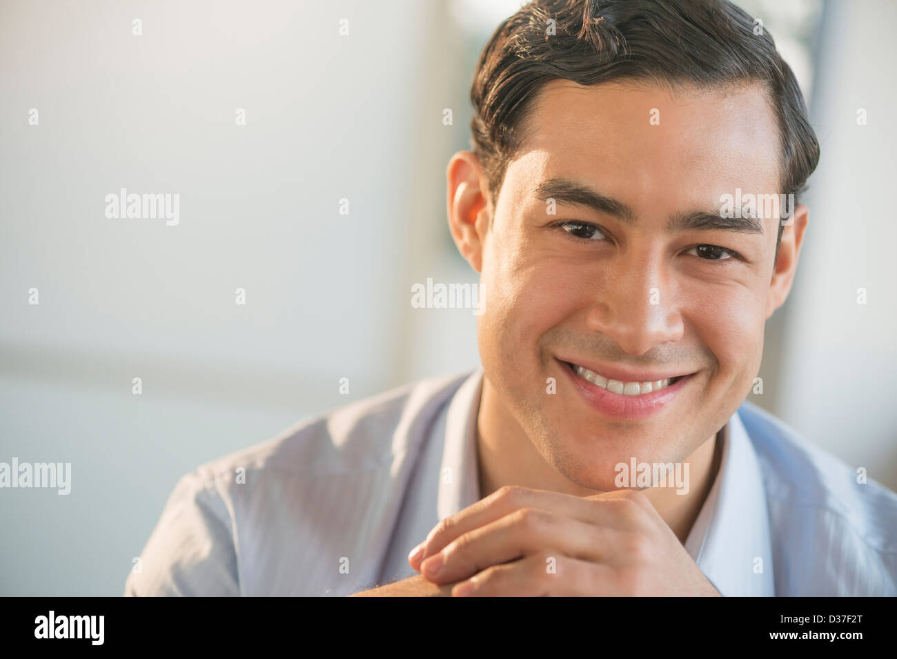 Male executive smiling hi-res stock photography and images - Alamy