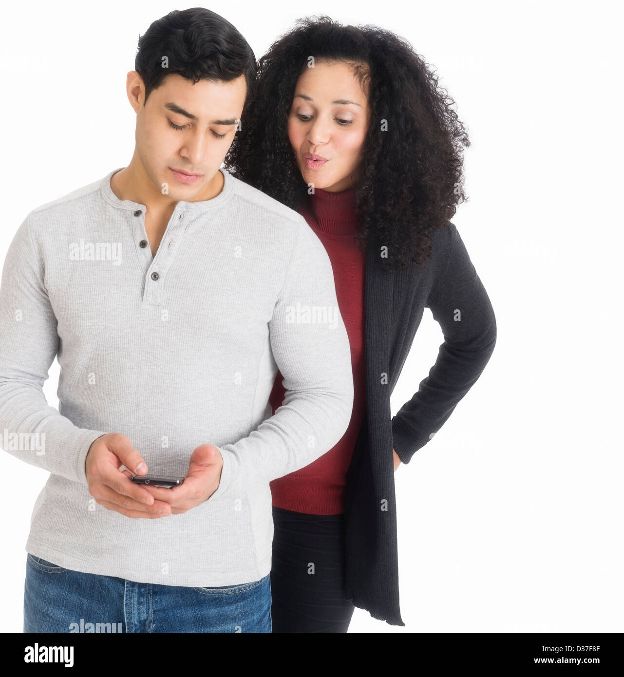 Couple looking cell phone hi-res stock photography and images - Alamy