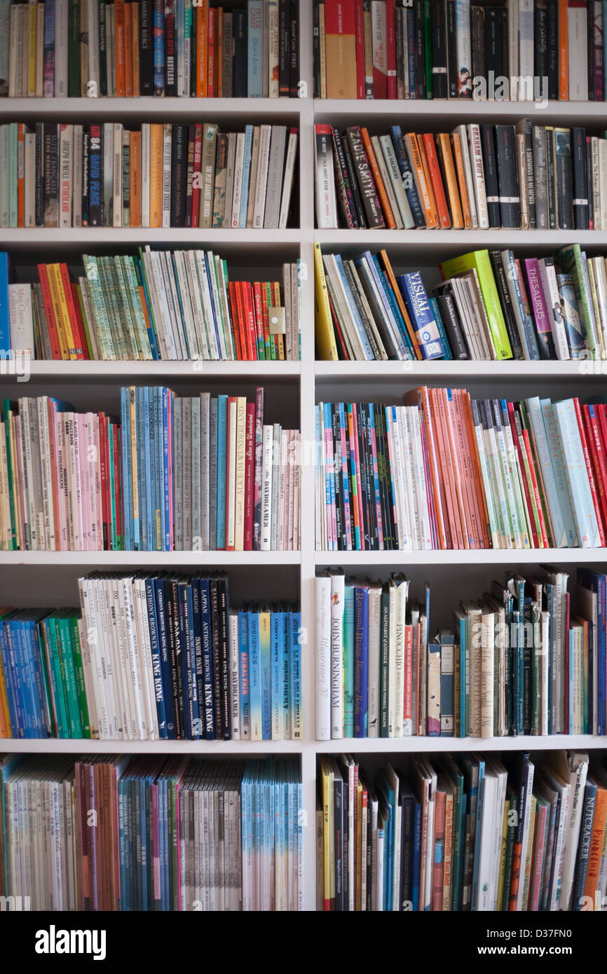 Book shelf full of books - portrait format Stock Photo - Alamy