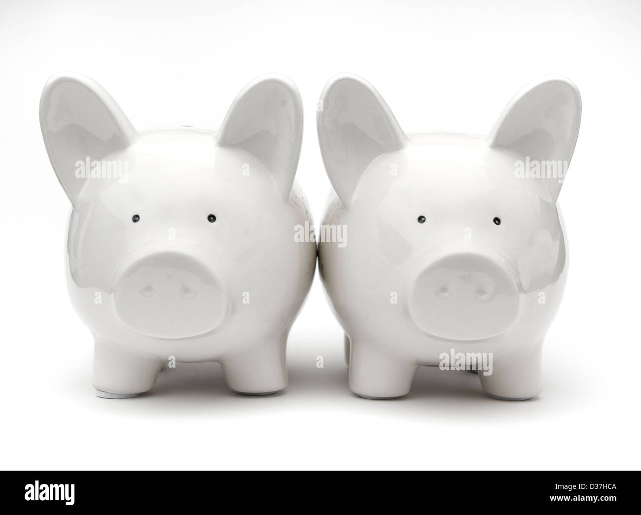 two piggy banks side by side Stock Photo - Alamy