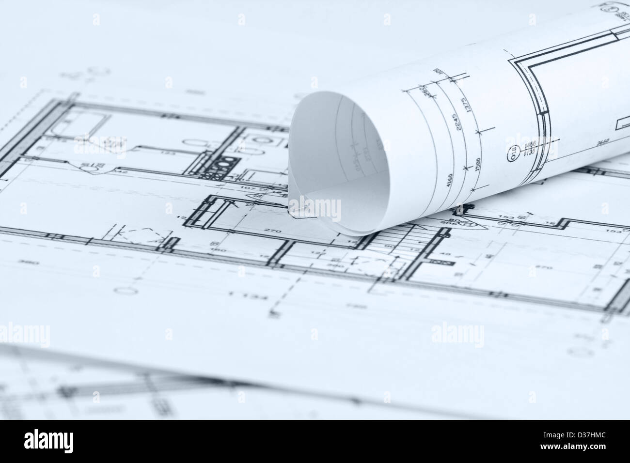 Architect rolls and house plans Stock Photo - Alamy