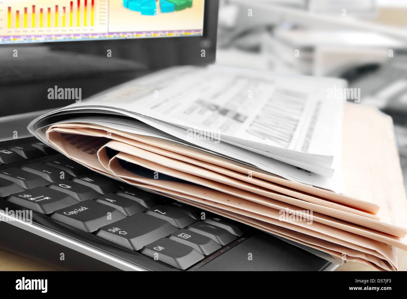 Newspapers on the Keyboard Stock Photo - Alamy
