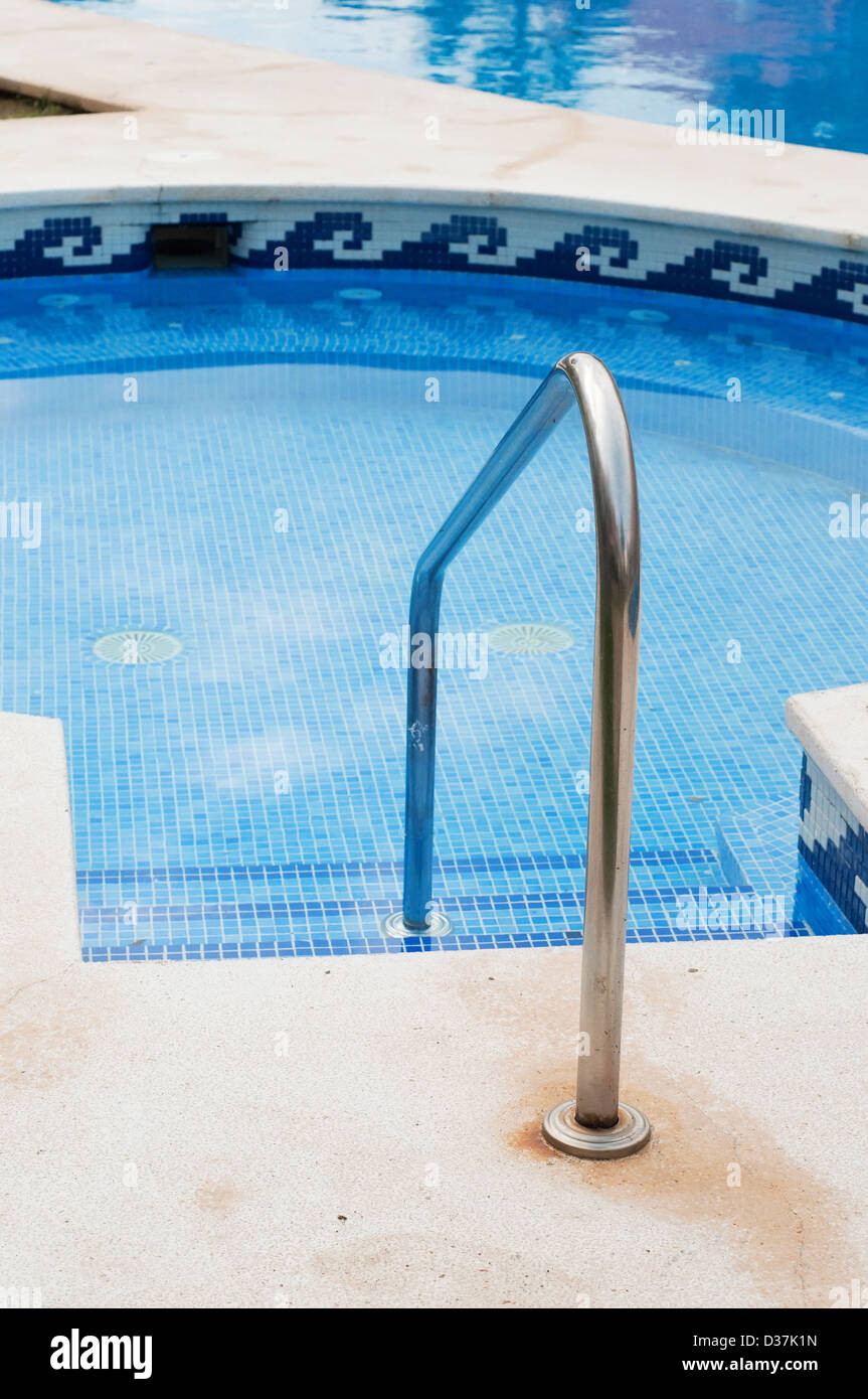 Blue swimming pool with stairs, outdoor shooting Stock Photo - Alamy