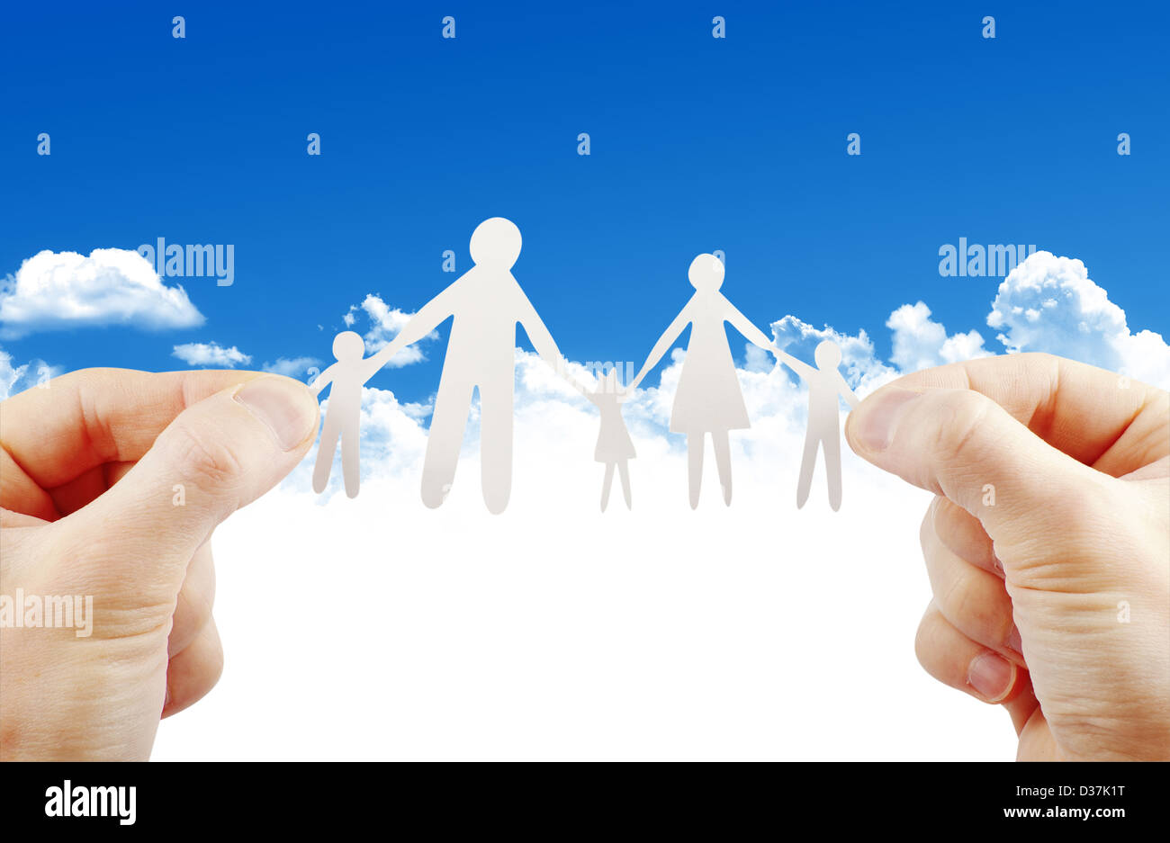 paper family in hands Stock Photo - Alamy