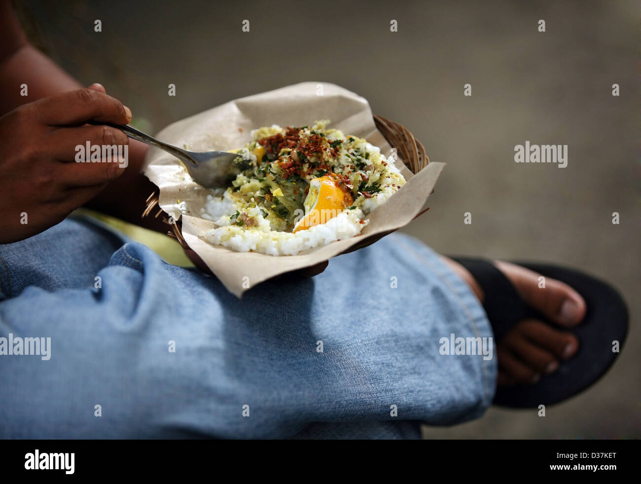 The Indonesian kitchen. Rice with an egg and vegetables Stock Photo - Alamy