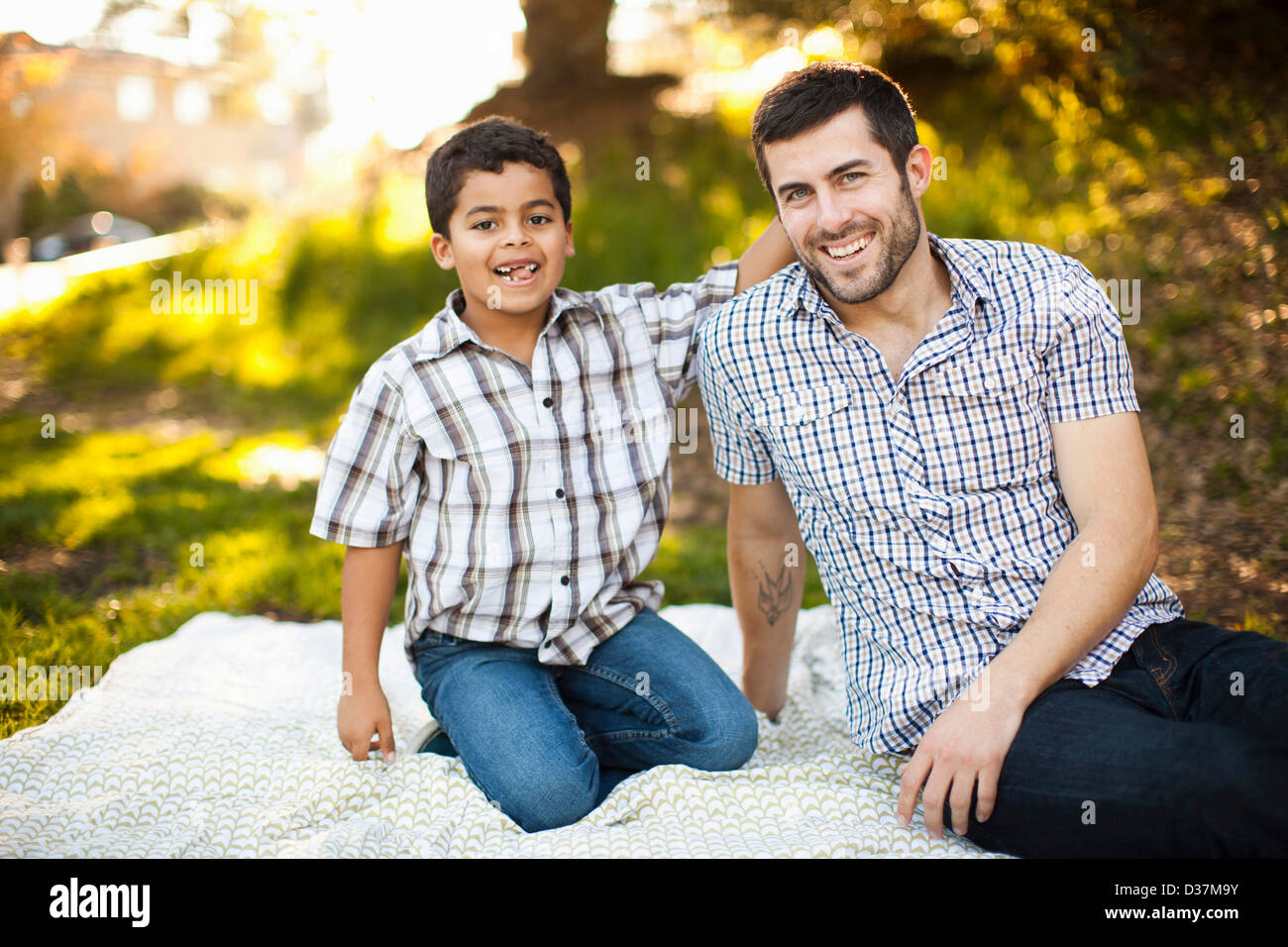 African American Father Son Sitting High Resolution Stock Photography ...
