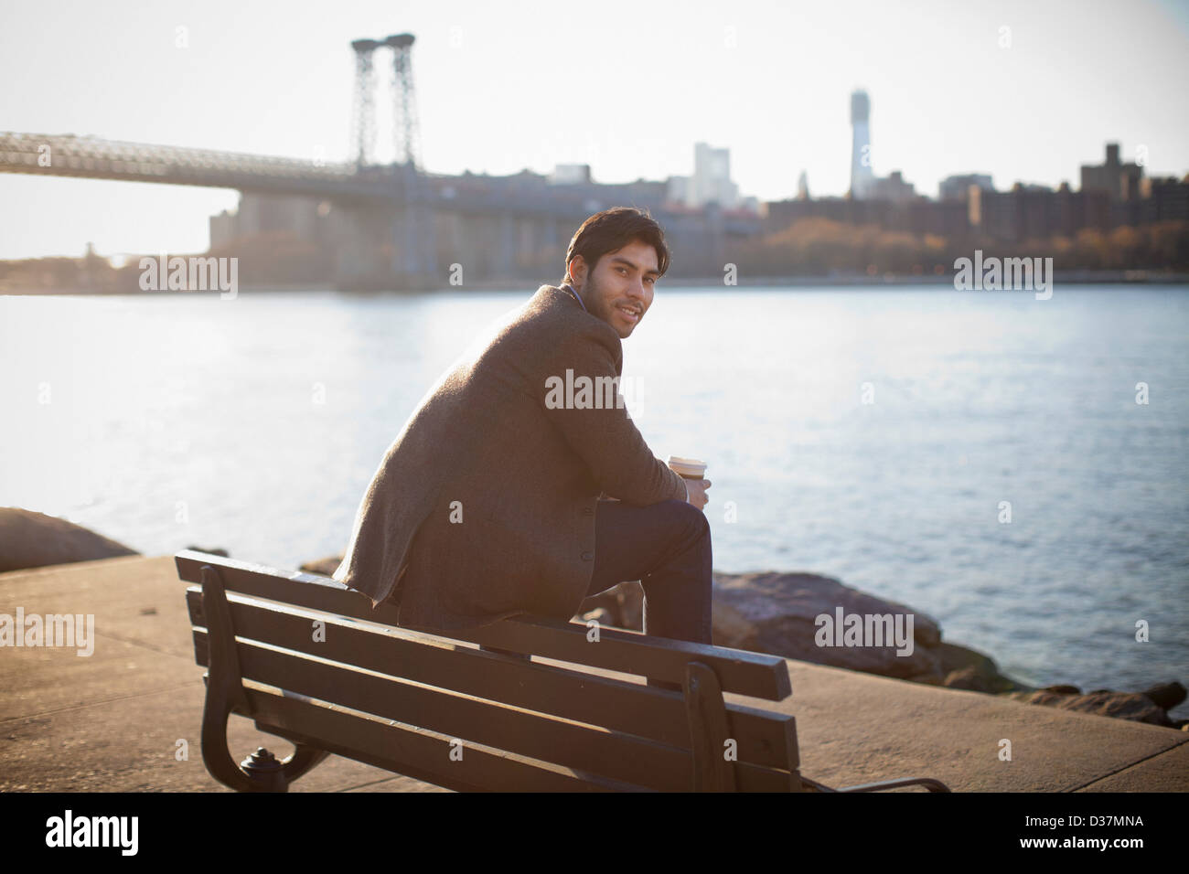 Man sitting on park bench hi-res stock photography and images - Alamy