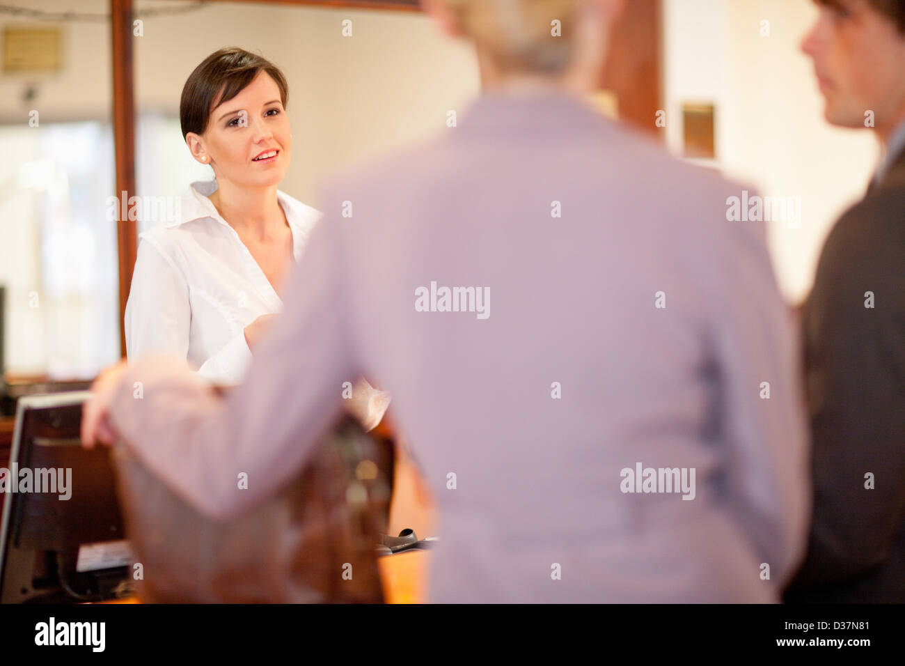 Hotel receptionist area hi-res stock photography and images - Alamy
