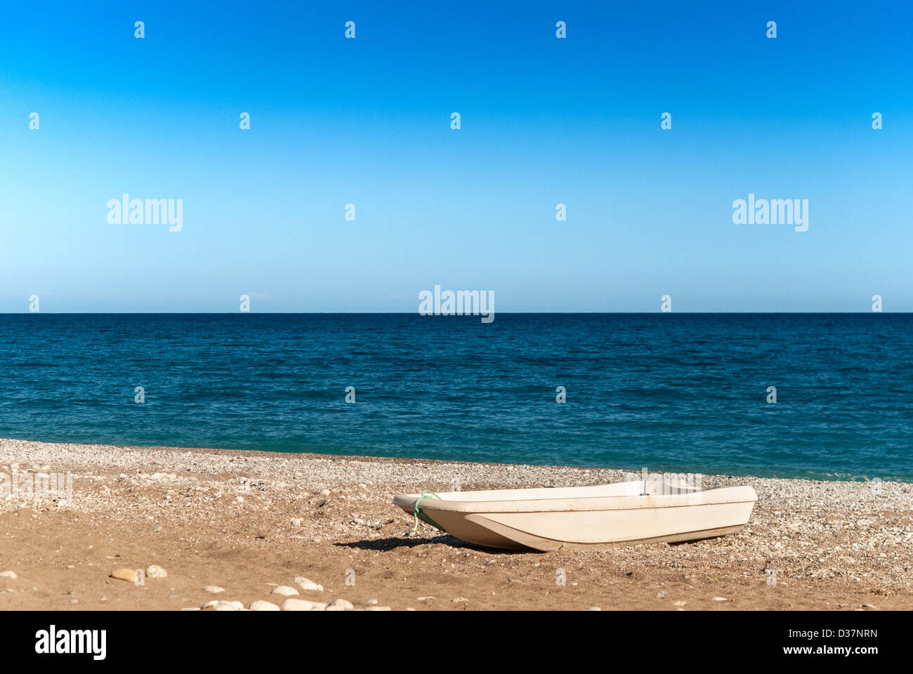 Boat on the beach with sea background Stock Photo - Alamy