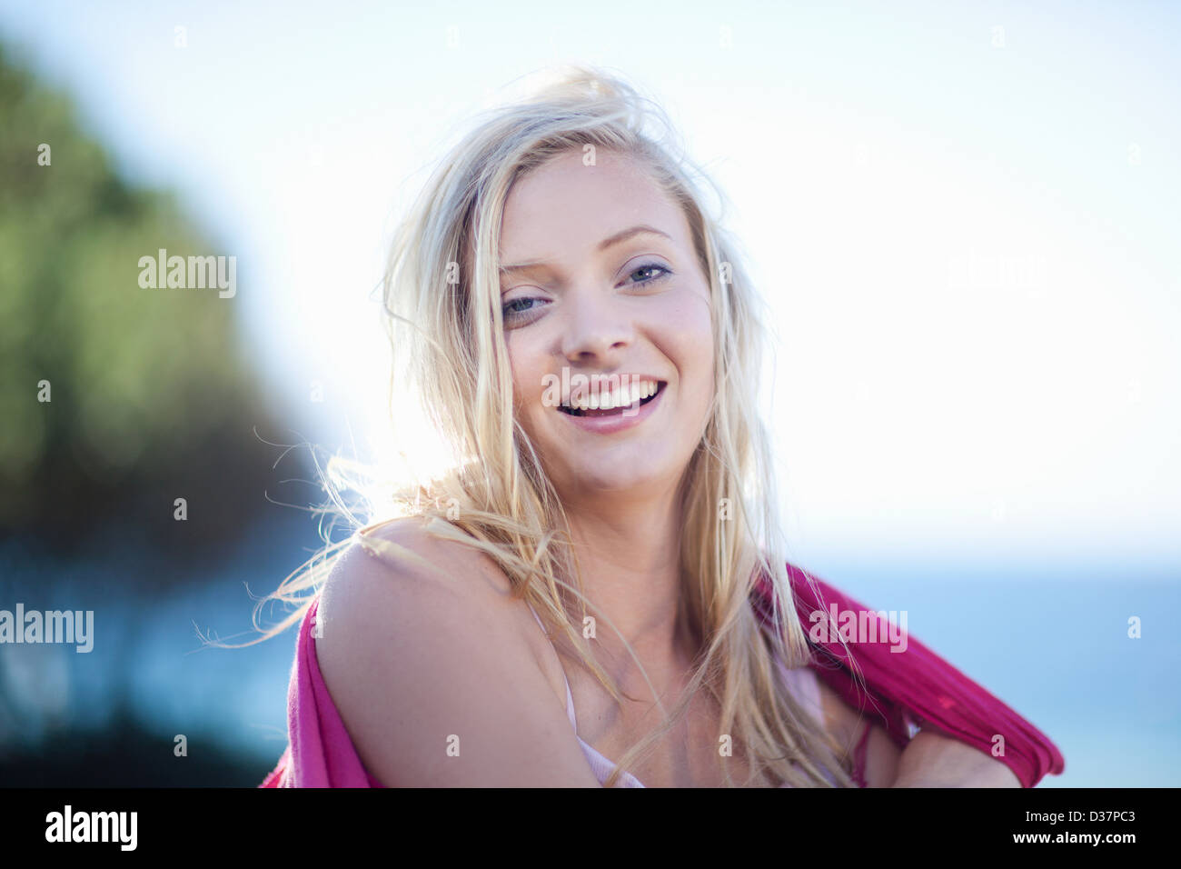 Woman wrapped in scarf outdoors Stock Photo - Alamy