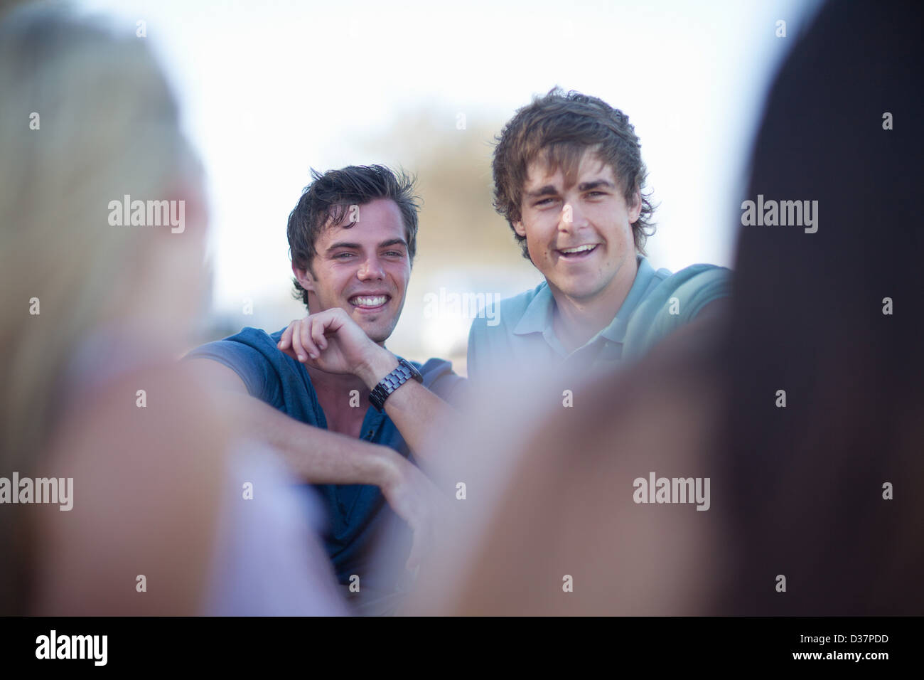 Men laughing together outdoors Stock Photo - Alamy
