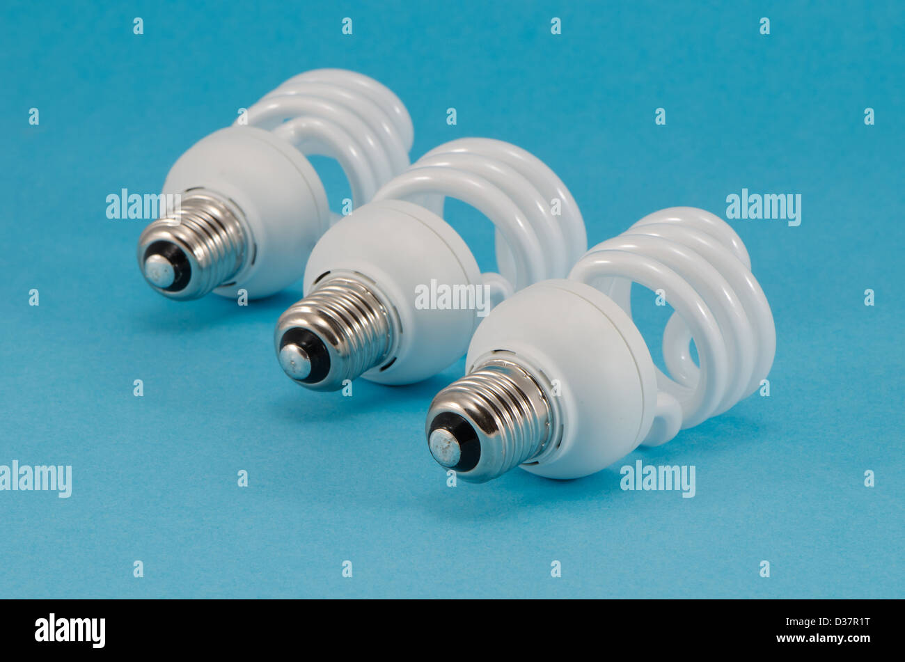 new novel fluorescent light bulbs on blue background. new technology ...