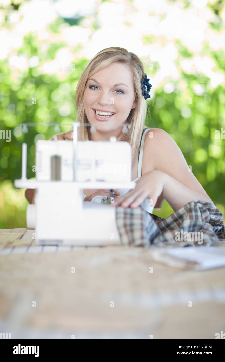 Woman working on sewing machine hi-res stock photography and images - Alamy