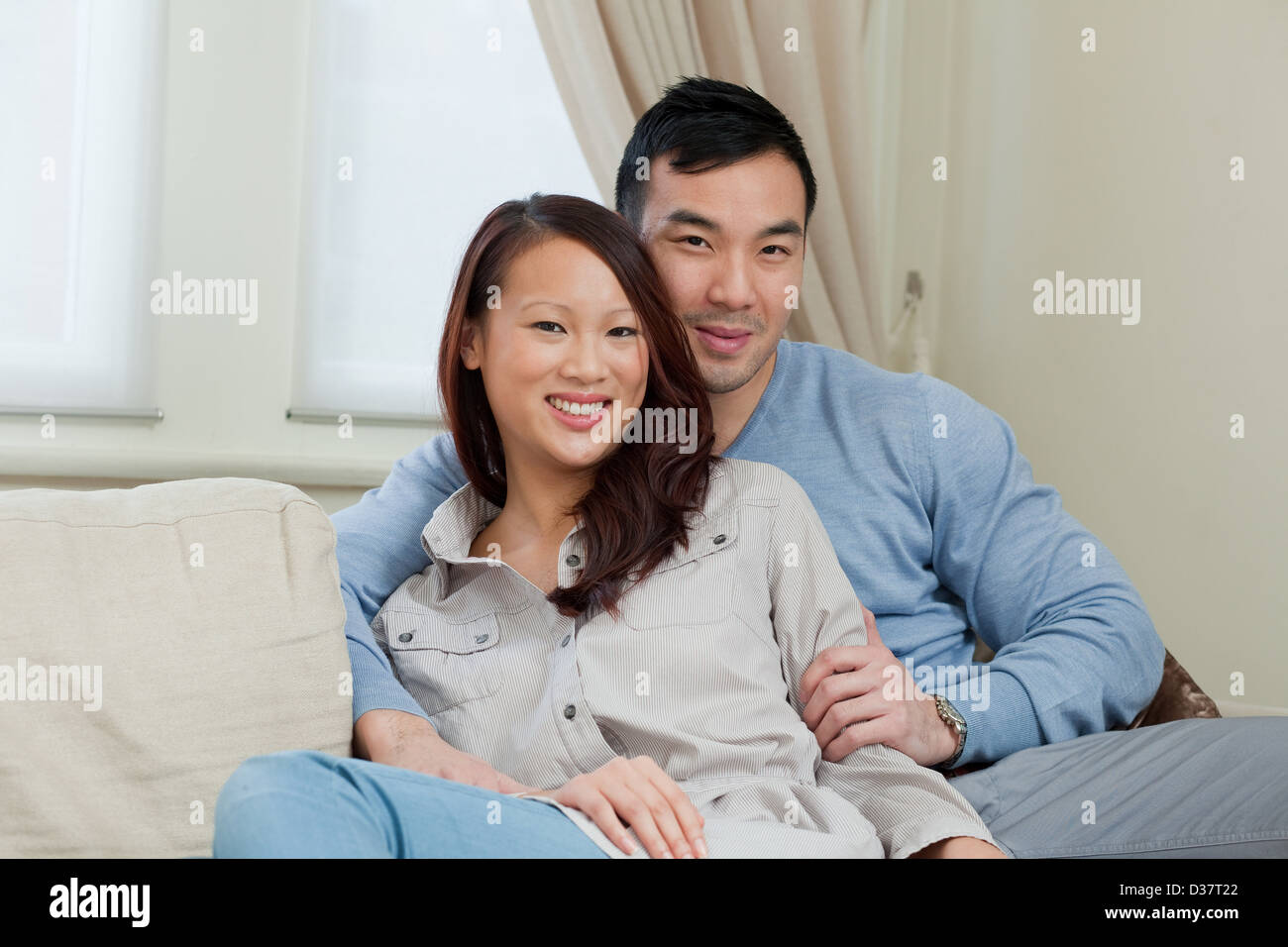 Married couple home on sofa hi-res stock photography and images - Alamy