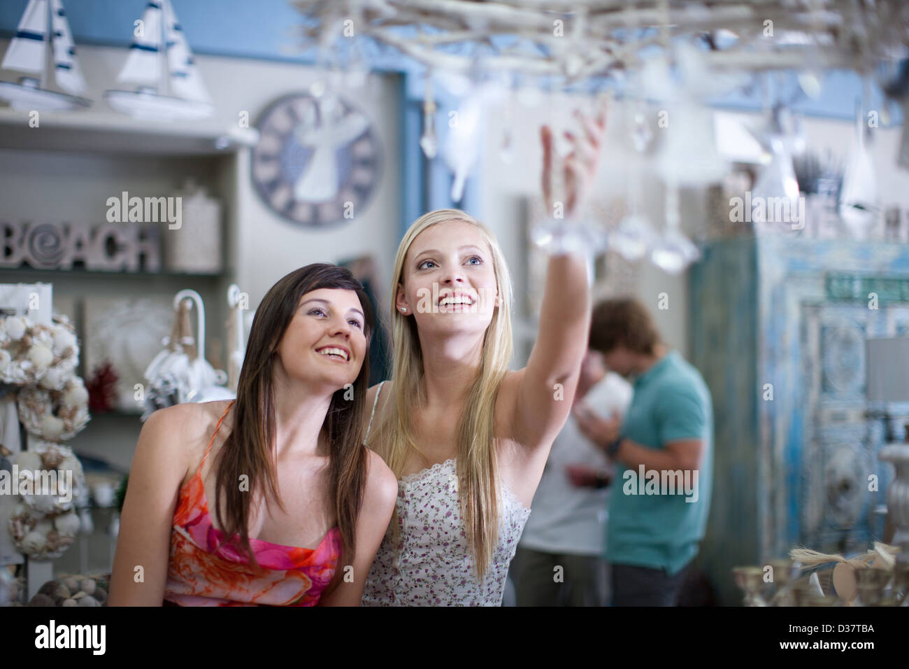 Women shopping together in store Stock Photo - Alamy