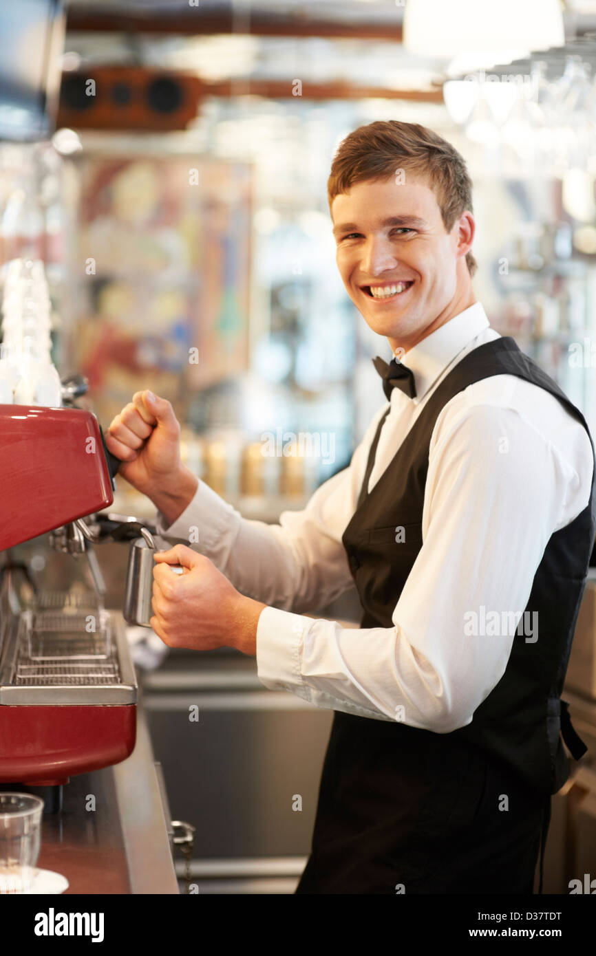 Denmark, Aarhus, Portrait of barista standing by coffee maker Stock ...