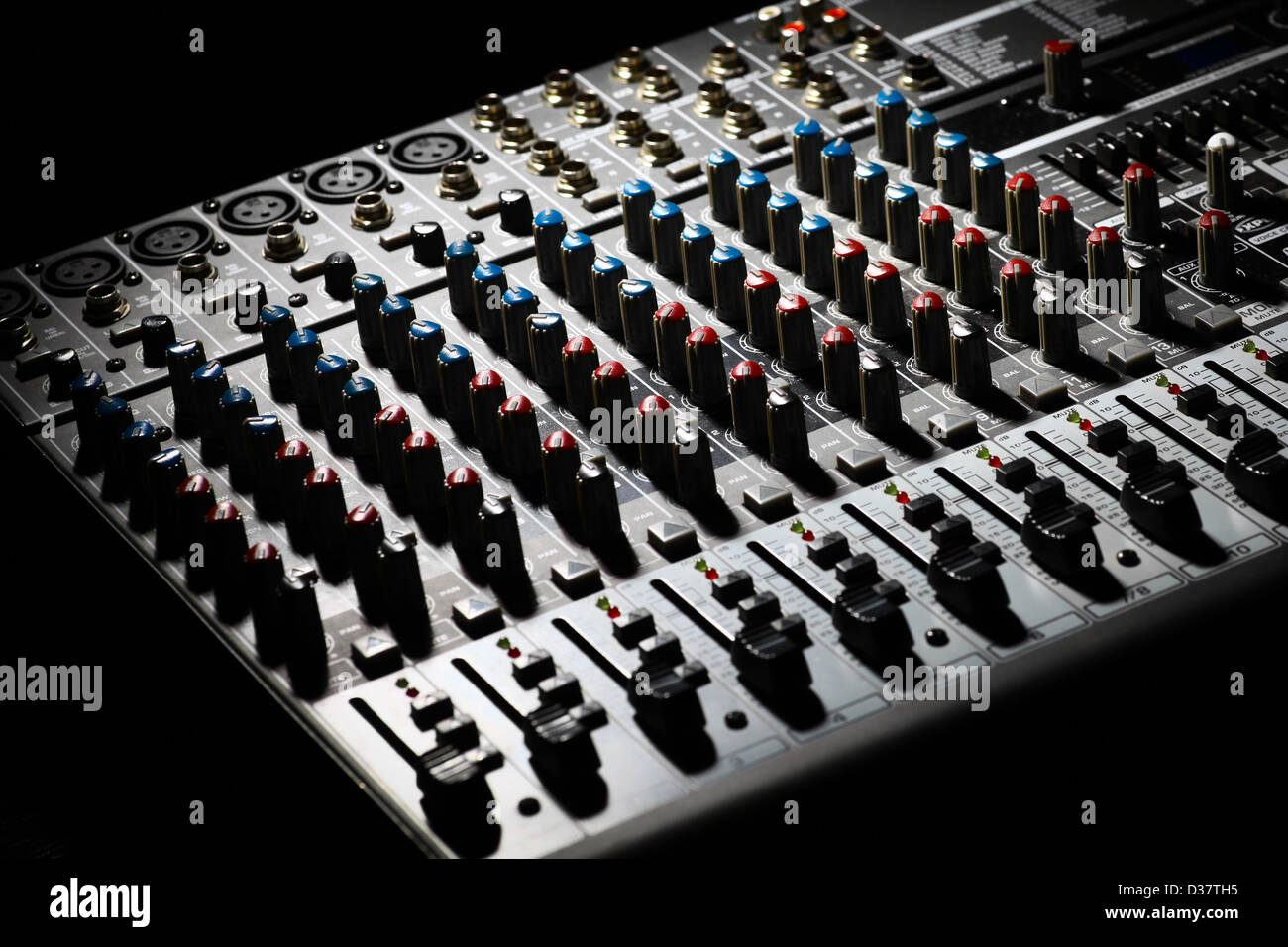 Detail of a music mixer desk with various knobs Stock Photo - Alamy