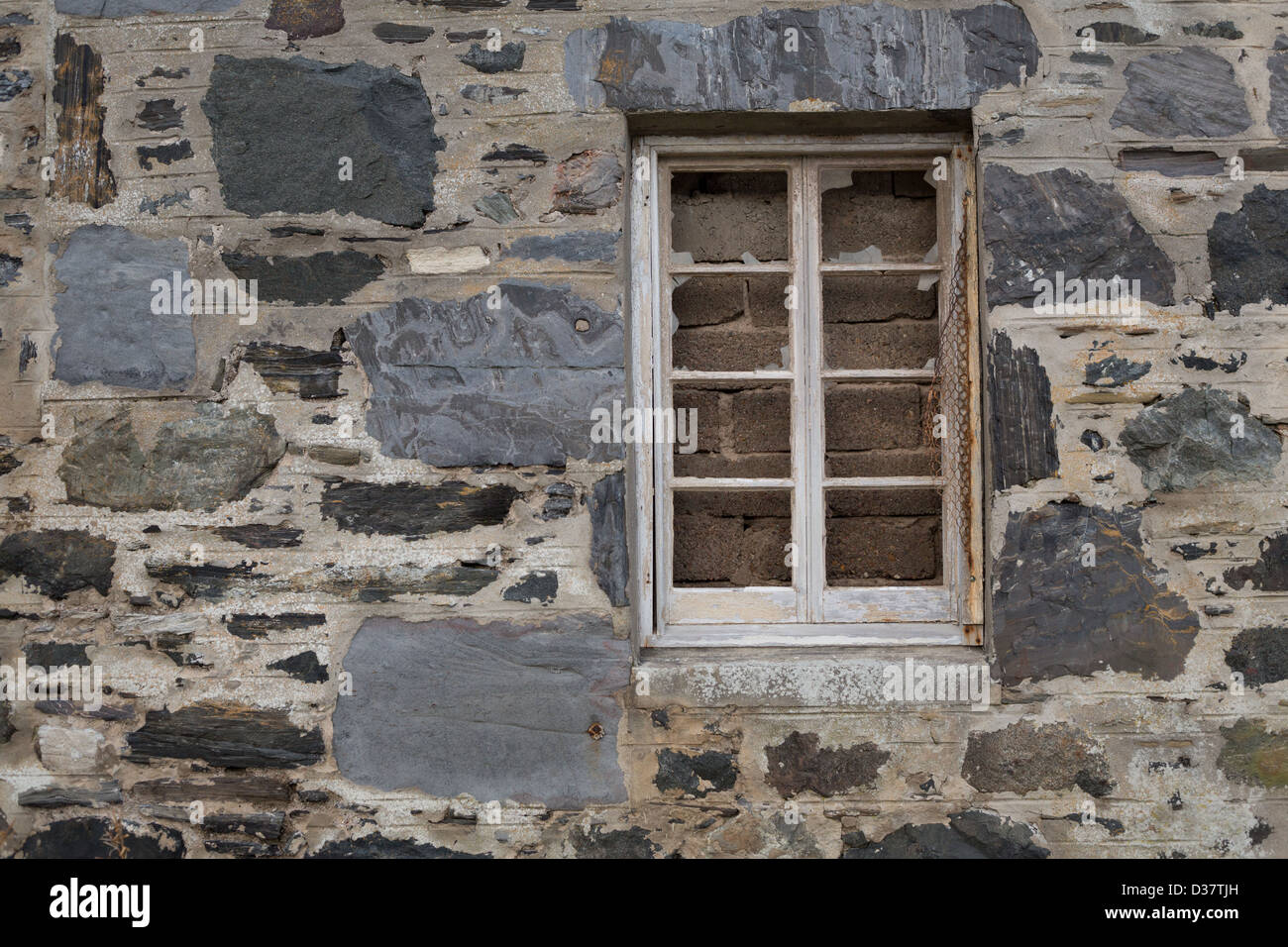 bricked up window, in a building's stone wall, Portsoy, Scotland Stock ...