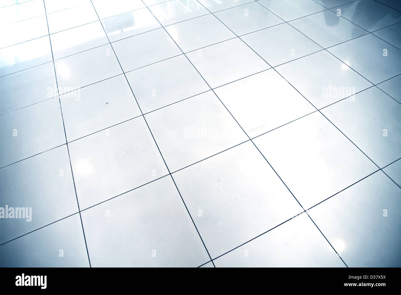 A reflective floor in a waiting hall Stock Photo - Alamy