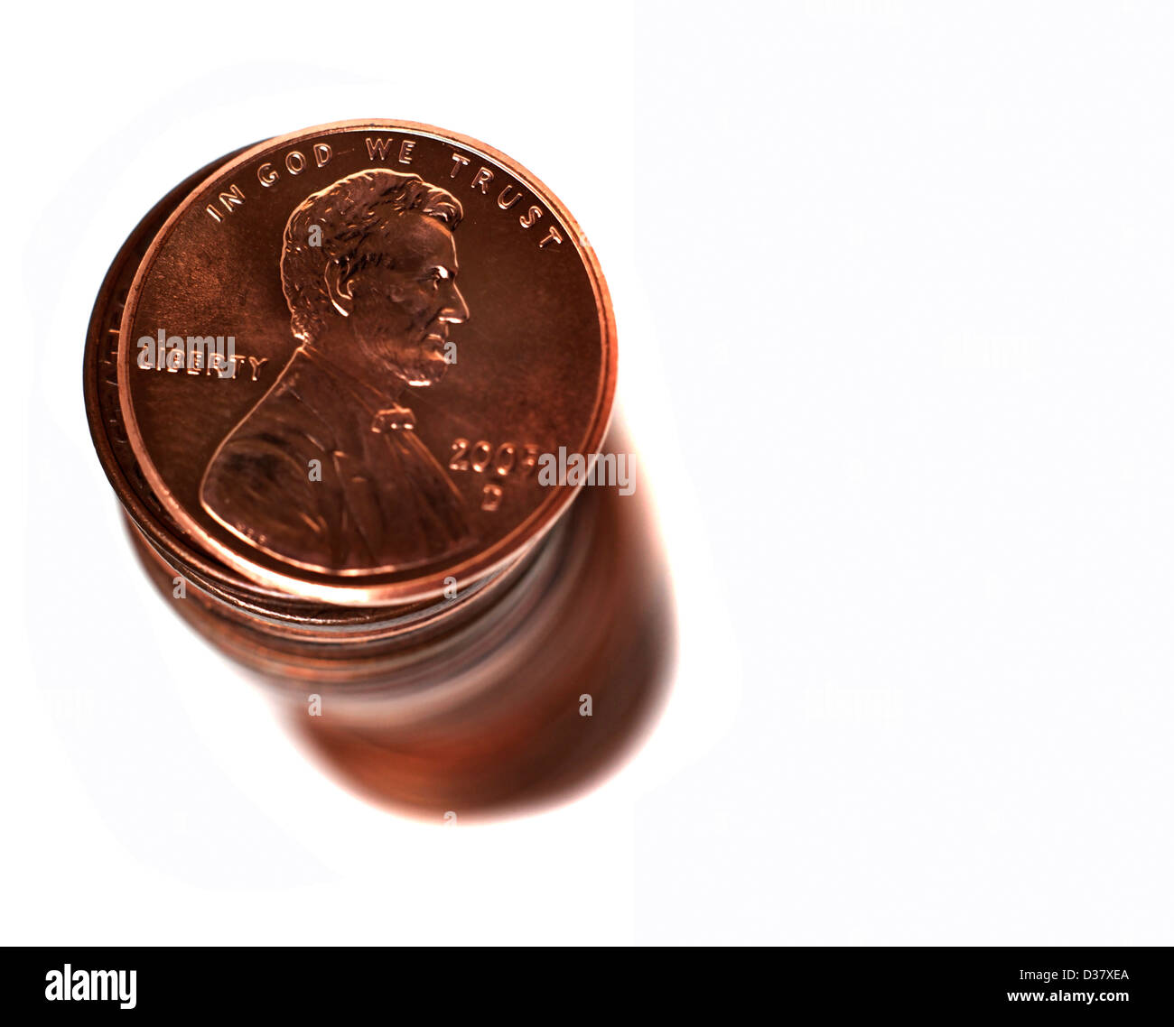 Stack of pennies isolated on white background Stock Photo - Alamy