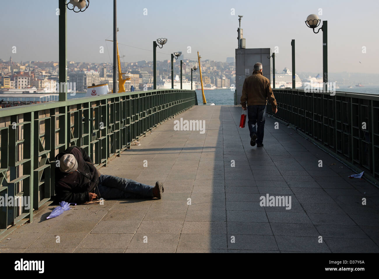Istanbul, Turkey, homeless on the pedestrian bridge on the Golden Horn ...