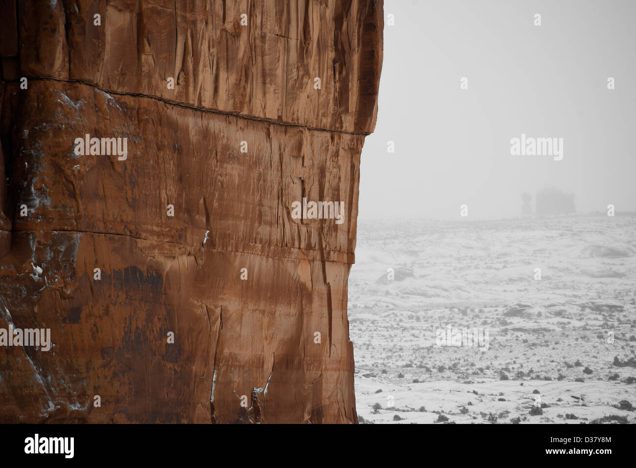 Balanced Rock in Arches National Park is seen shrouded in snow during ...