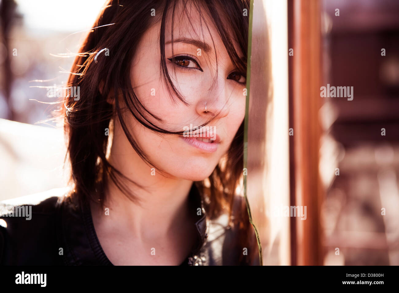 Young beautiful woman staring at camera Stock Photo - Alamy