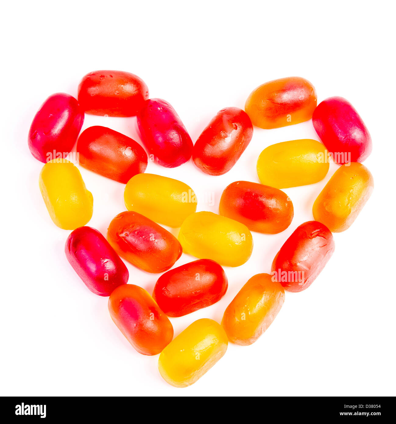 Colorful jelly candy love note in shape of heart isolated on white ...