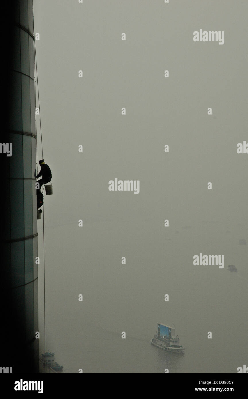 window cleaner, shanghai, march 2007 Stock Photo - Alamy