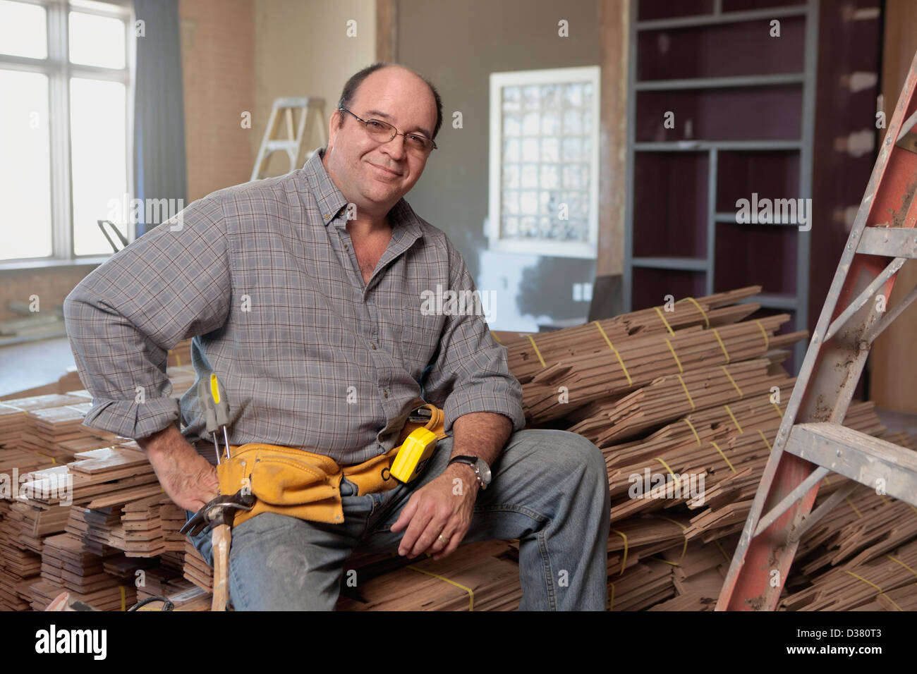 USA, Texas, Dallas, Man sitting on stack of planks Stock Photo - Alamy