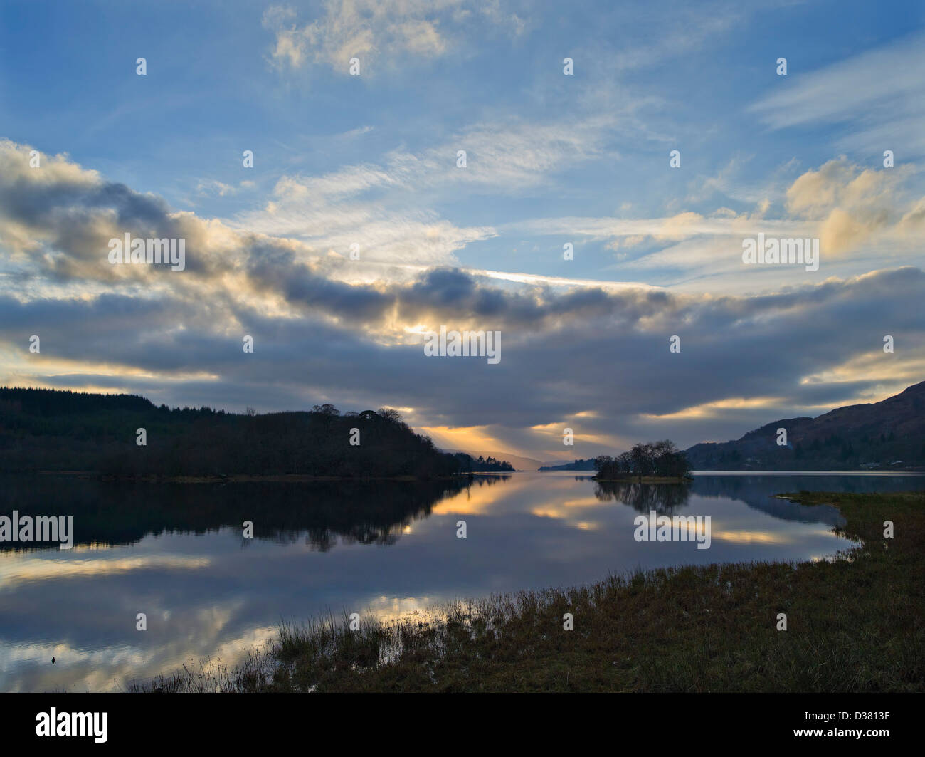 Sunset sky reflecting in still waters of Loch Awe, Argyll, Scotland ...