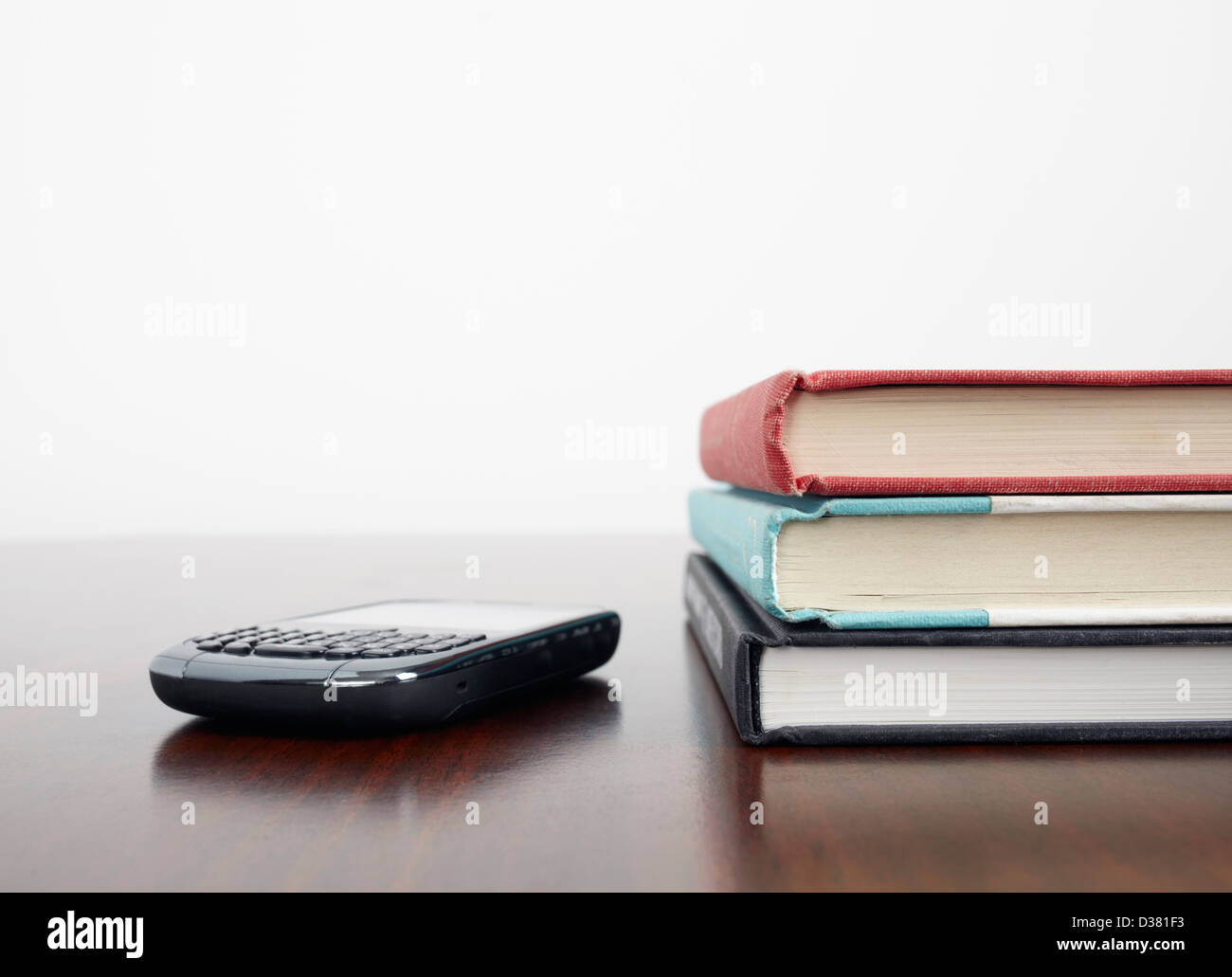 Book and mobile phone hi-res stock photography and images - Alamy
