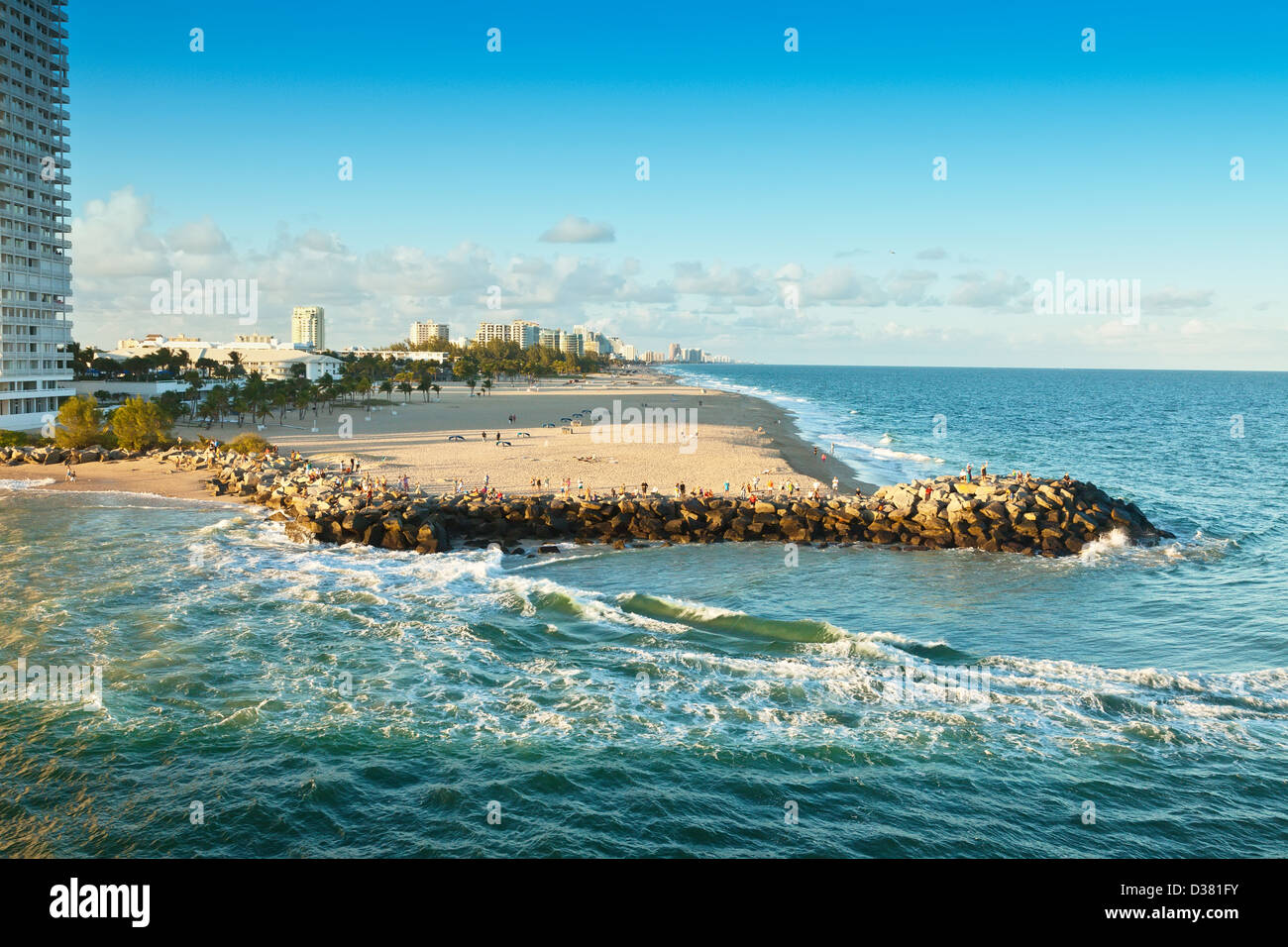 The inlet to the Atlantic Ocean for cruise ships creates a beach end ...