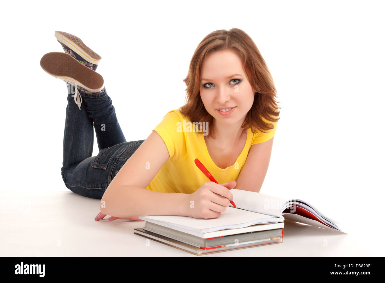 Student lying and studying Stock Photo - Alamy