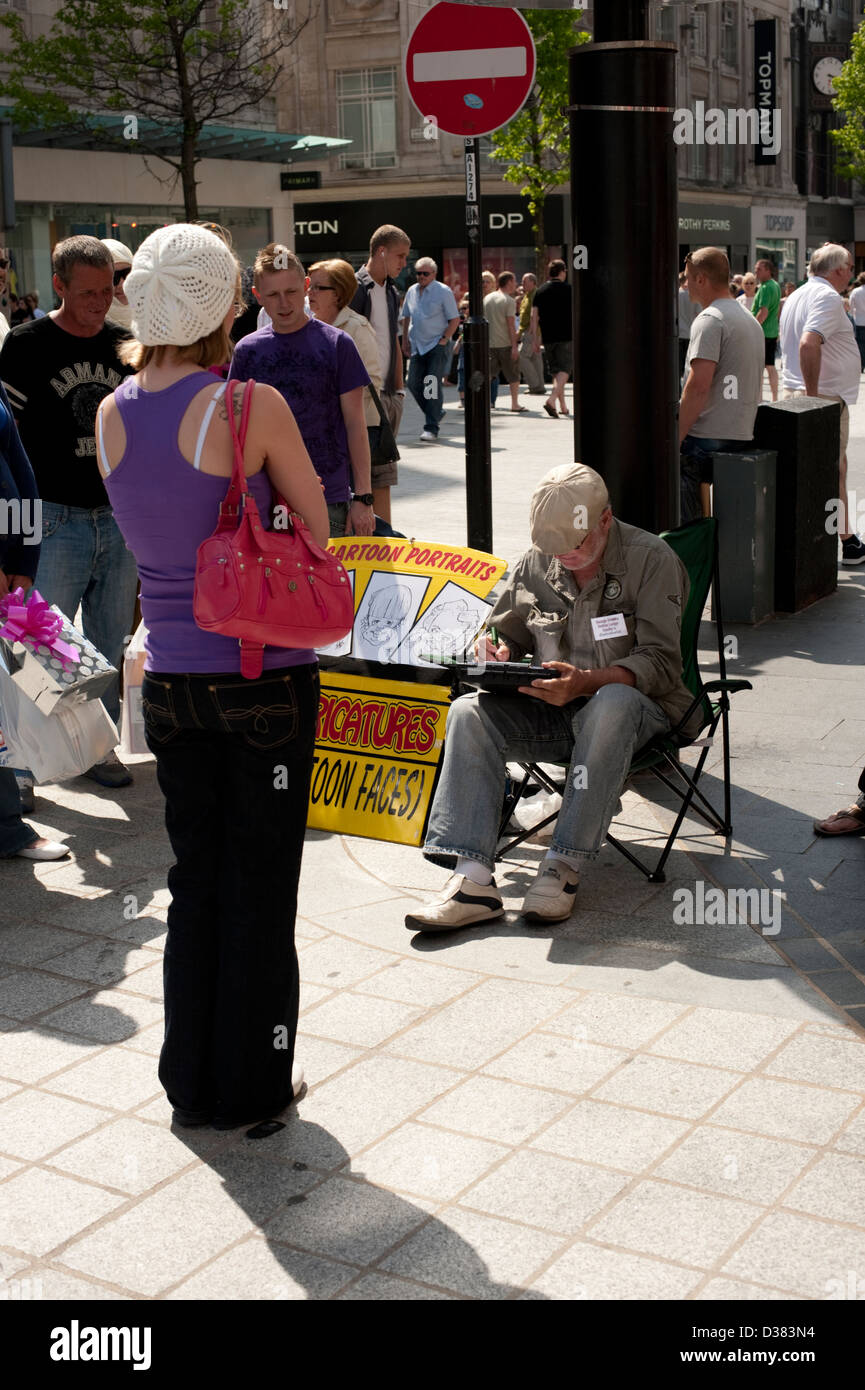 Street artist drawing portraits public sitting Stock Photo - Alamy