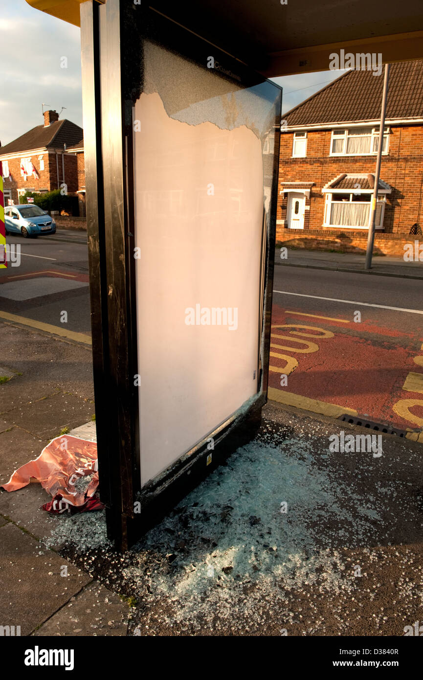 Smashed vandalised bus stop broken glass Stock Photo - Alamy