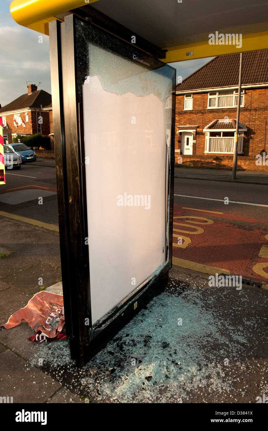 Smashed vandalised bus stop broken glass Stock Photo - Alamy