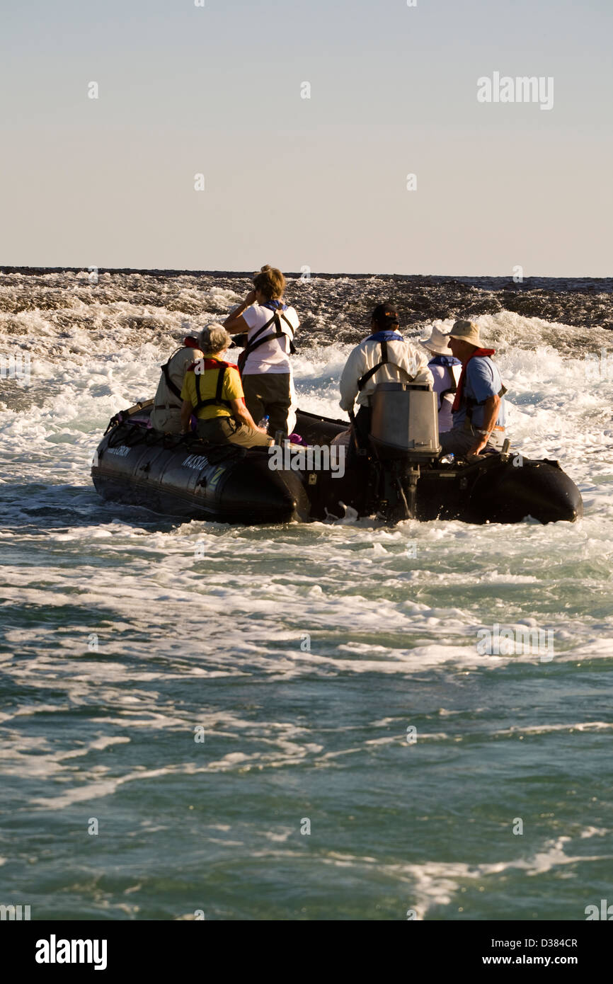 Zodiacs probe the Montgomery Reef, the world's largest inshore reef ...