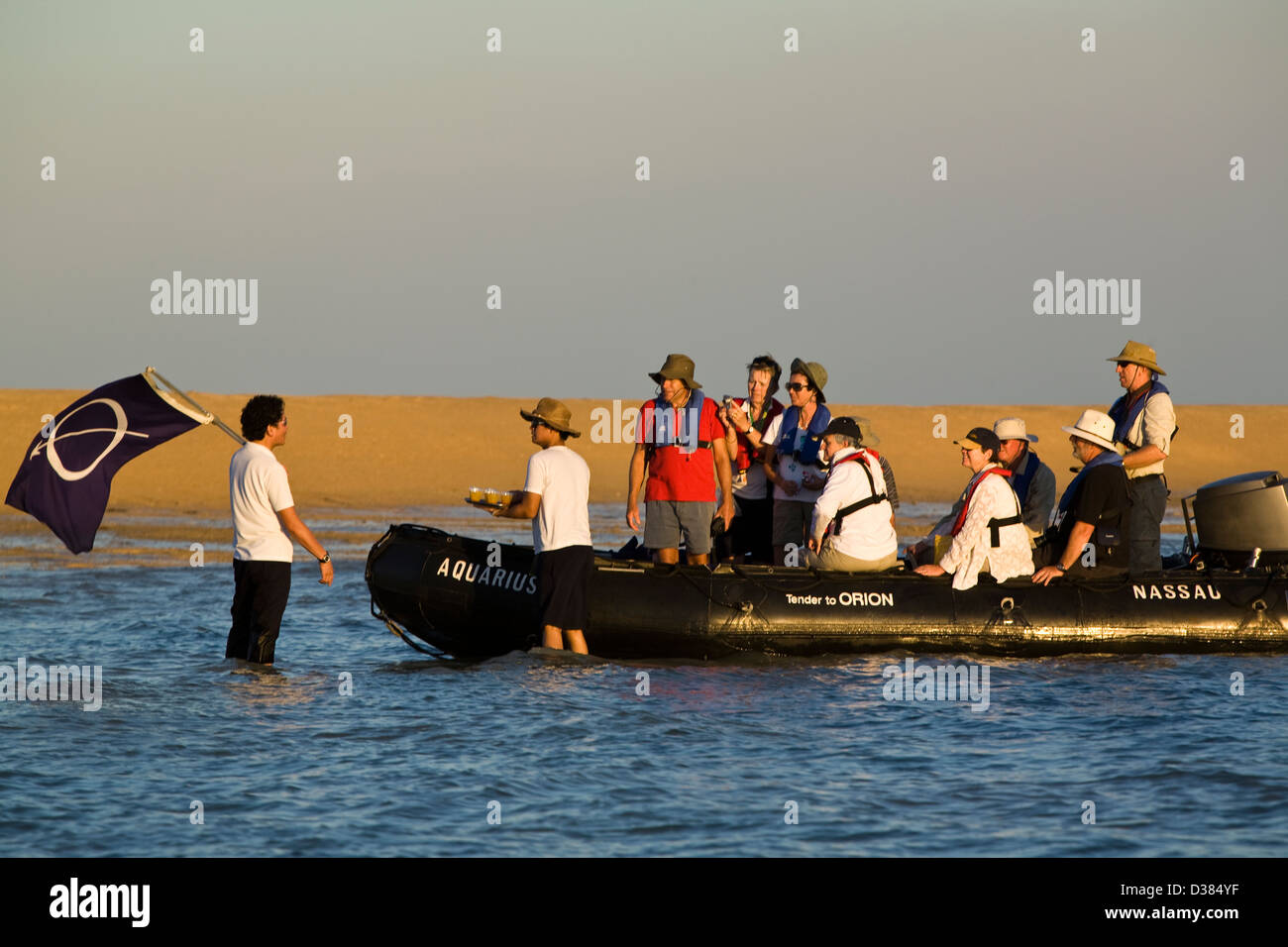 Refreshments upon returning from a Zodiac excursion at Montgomery Reef ...