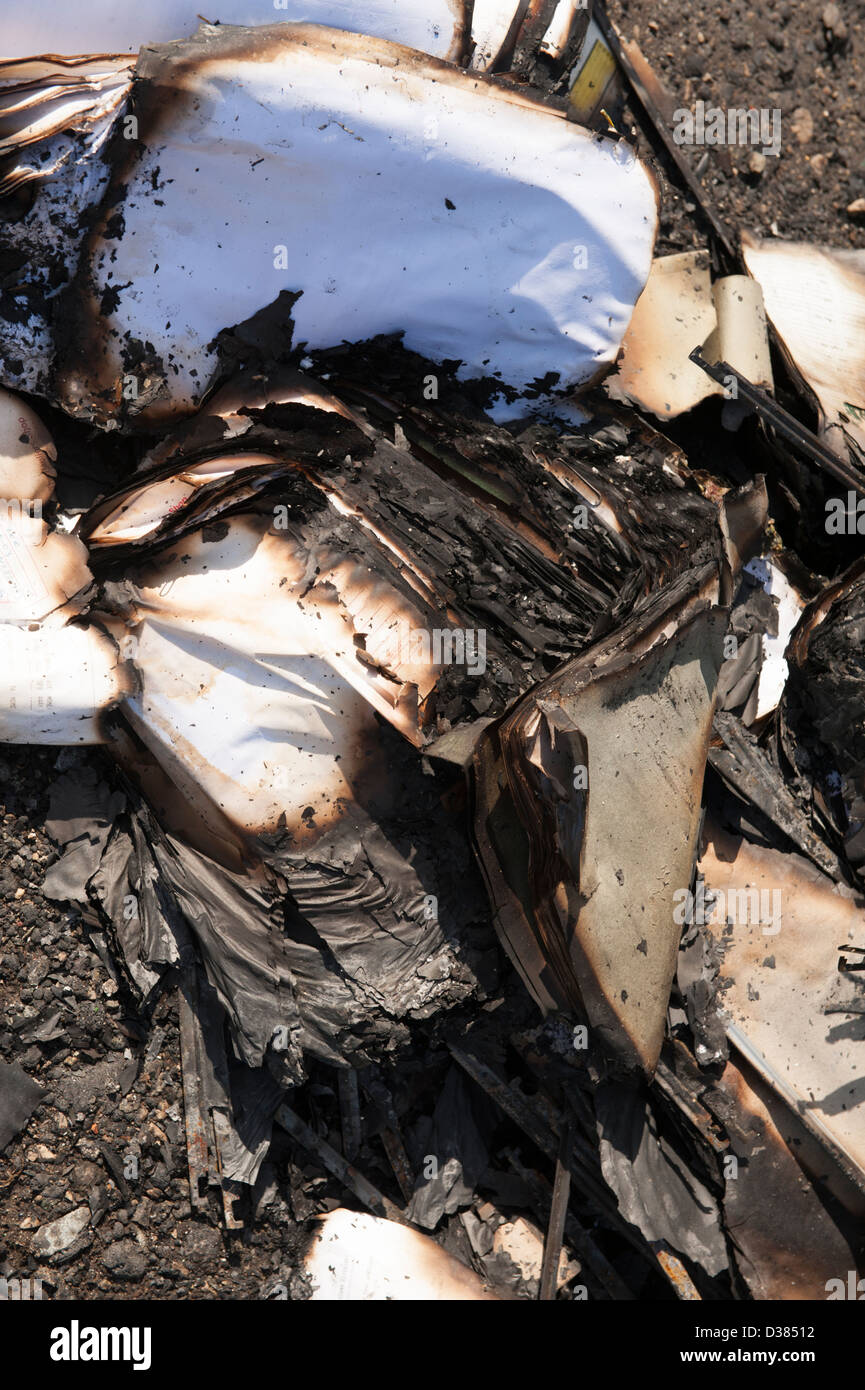 Burnt office company paperwork destroyed evidence Stock Photo - Alamy