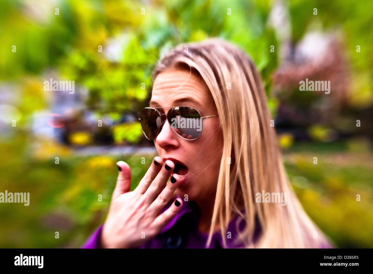 Young Woman looking alarmed Stock Photo - Alamy