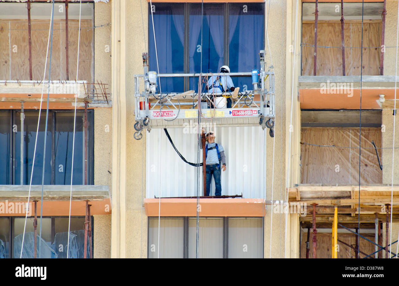 Construction scaffolding hanging hi-res stock photography and images ...