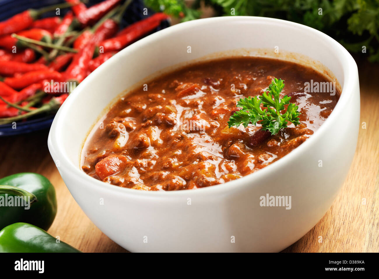 bowl of red hot chili with ground beef, beans and legumes Stock Photo ...