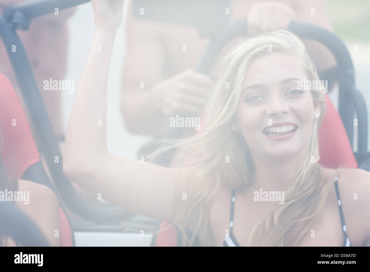 Smiling woman riding in jeep Stock Photo - Alamy