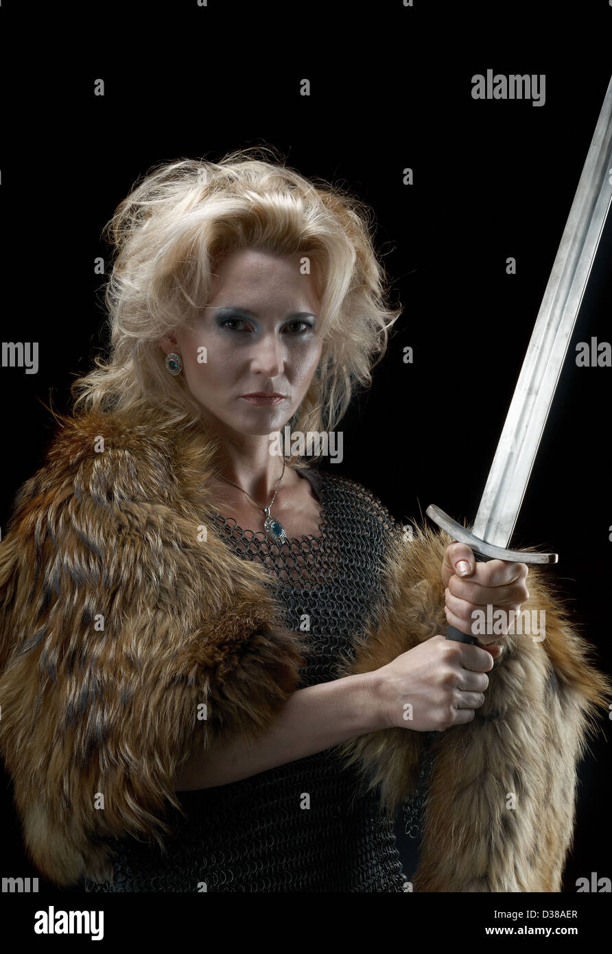 Valkyrie.Viking girl with sword Stock Photo - Alamy