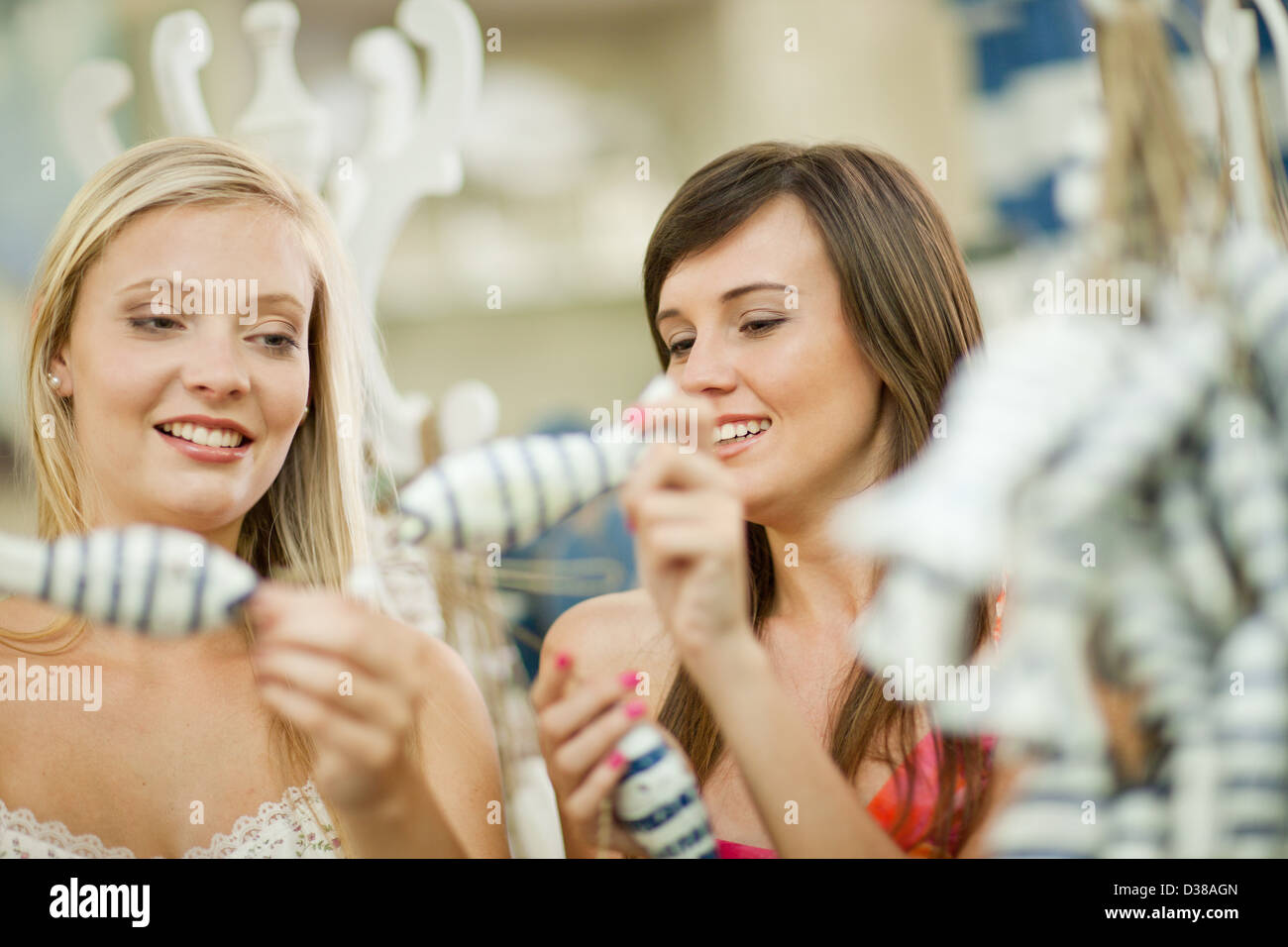 Women shopping together in store Stock Photo - Alamy