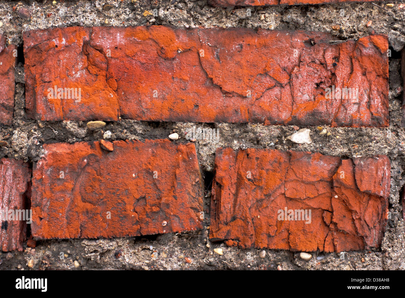three Bricks in old Wall Stock Photo - Alamy