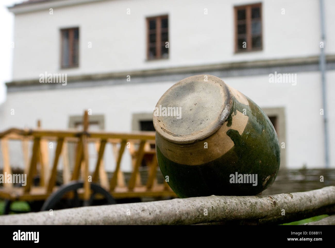 Clay pot put up on a wooden fence Stock Photo - Alamy