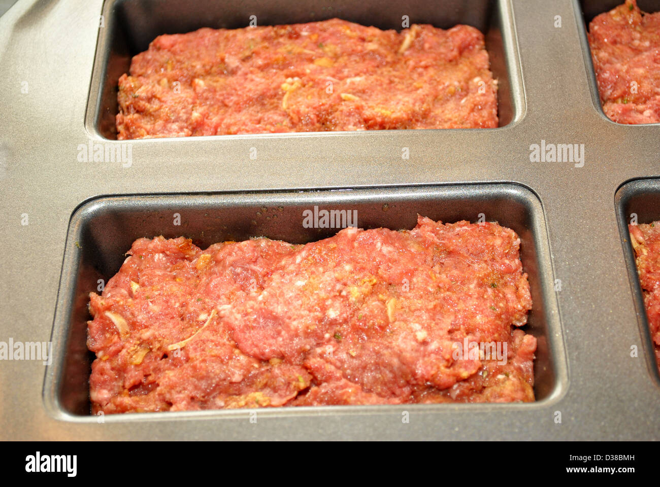 Raw Mini Meatloaves Stock Photo - Alamy
